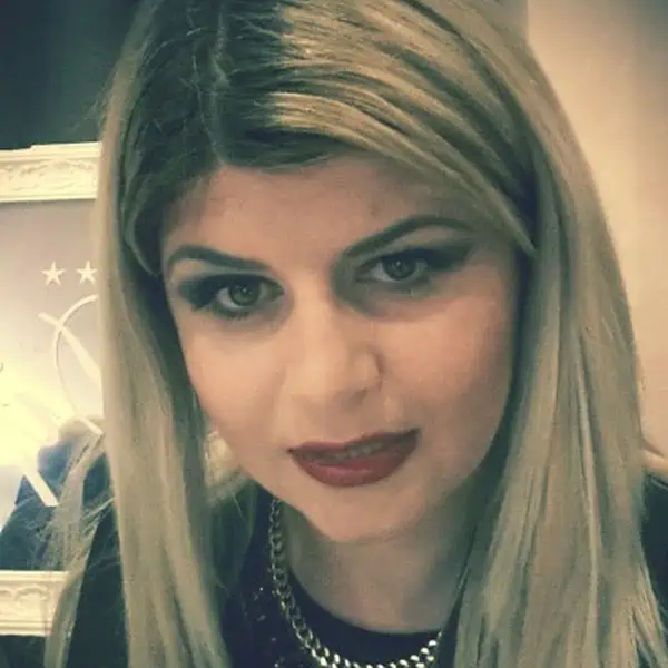 Elona Merko, Këngë